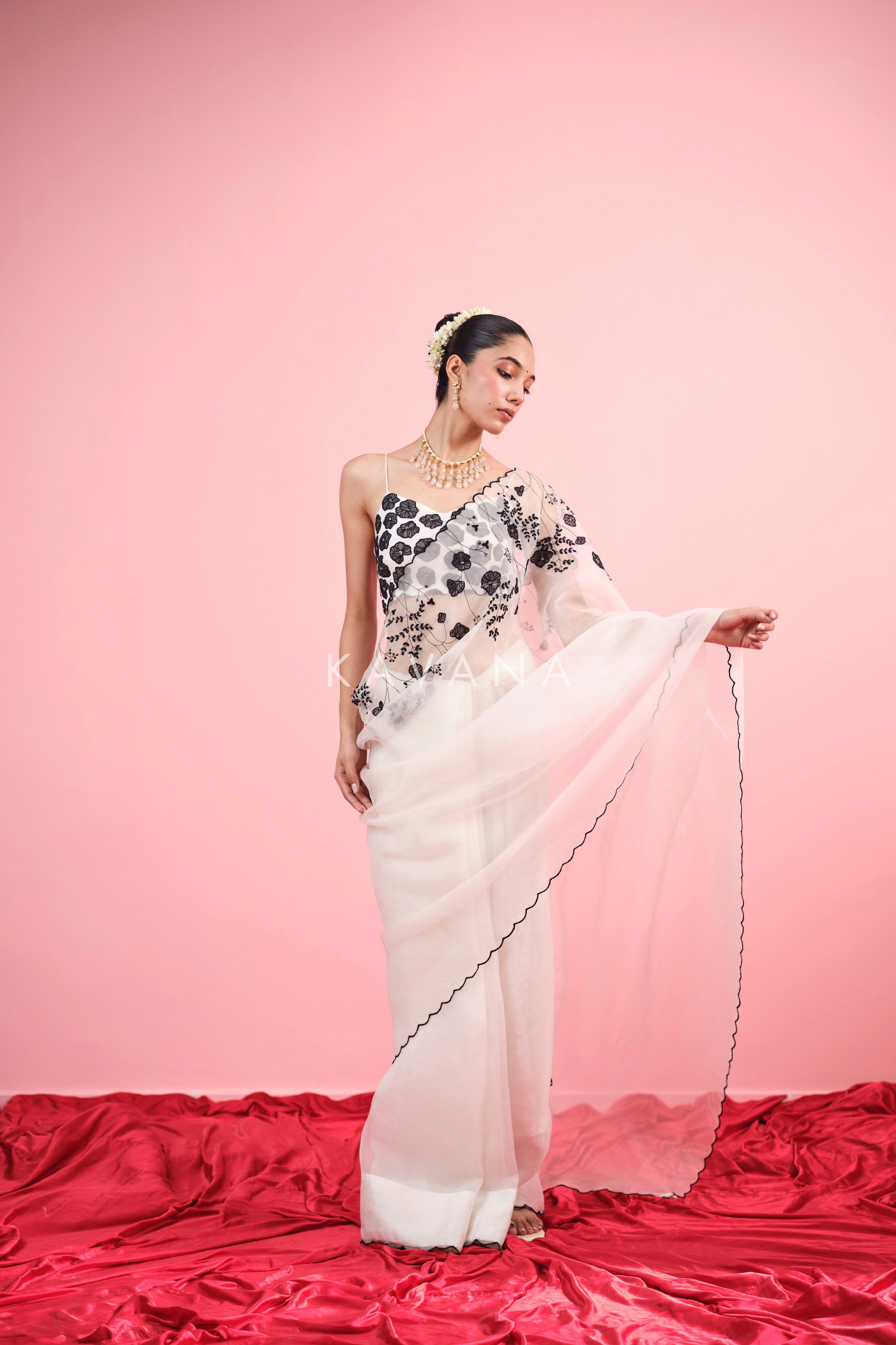 Handwoven chanderi sari with hand embroidery and scallop details